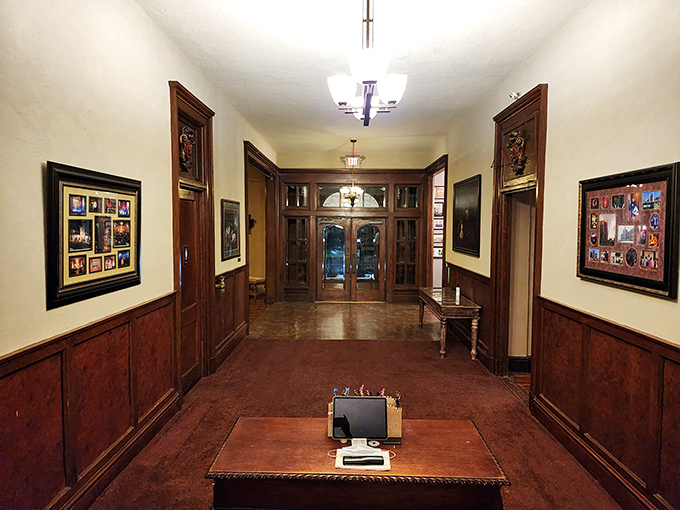The entryway's rich wood paneling and vintage details transport visitors to another era&mdash;no DeLorean required. 