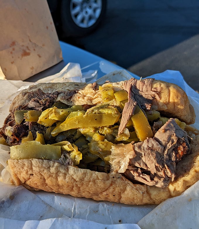 Behold the holy grail&mdash;thin-sliced beef swimming in savory jus, crowned with vibrant peppers, all nestled in bread that somehow maintains structural integrity.