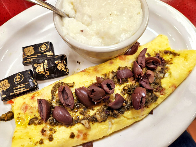 The Italian omelet arrives like a golden sunrise filled with Mediterranean dreams and melted cheese.