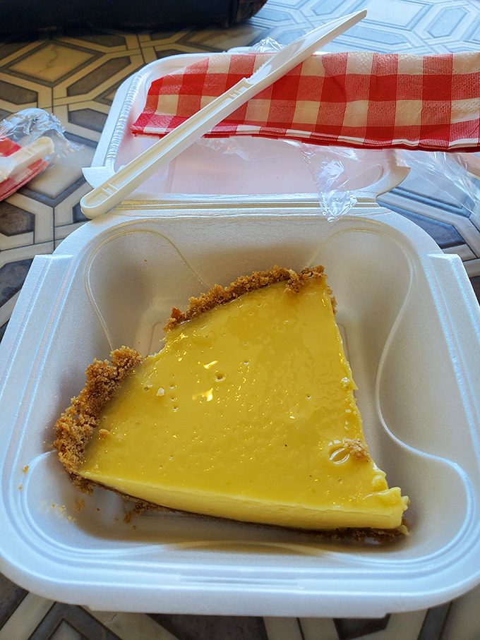 This key lime pie's pale yellow hue signals authenticity&mdash;no neon food coloring here, just pure Florida sunshine transformed into creamy, tangy perfection.