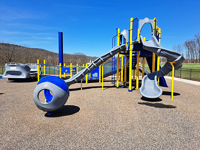 Modern playground equipment against the backdrop of Pennsylvania's rolling hills&mdash;where kids burn energy while parents soak in those mountain views.