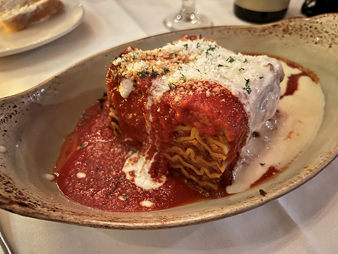 The legendary lasagna that launched a thousand road trips. Those perfect layers of pasta, cheese, and sauce are the edible equivalent of a warm hug.