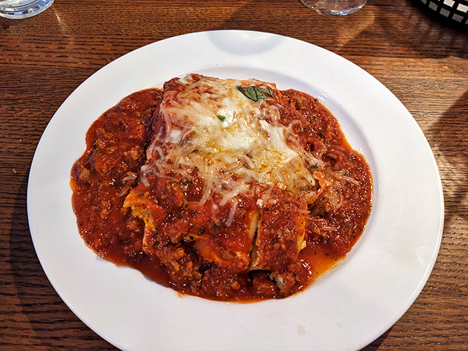 Behold the star attraction: lasagna that doesn't tower for show but delivers layers of flavor that'll make you close your eyes in silent appreciation.