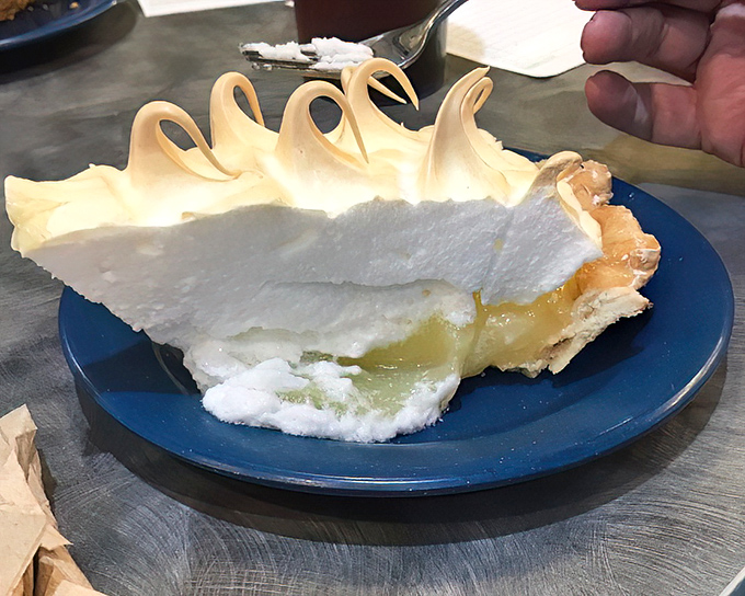 This lemon meringue pie with its cloud-like peaks isn't just dessert&mdash;it's edible architecture that would make Frank Lloyd Wright weep with joy