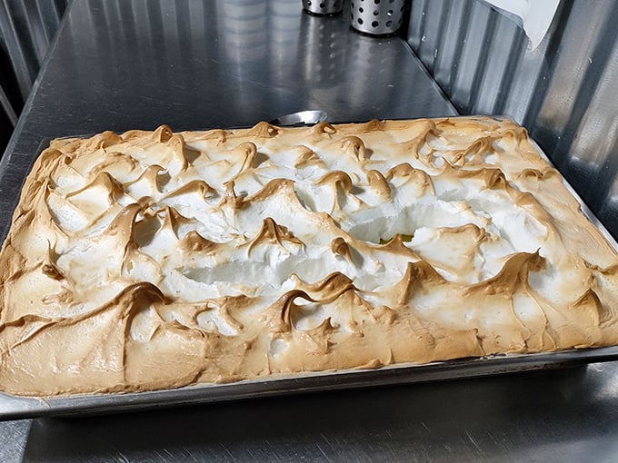 Behold the golden-peaked masterpiece! This meringue mountain isn't just dessert&mdash;it's architecture with a sweet disposition.