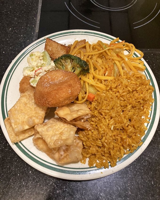 A plate that tells the story of buffet strategy &ndash; crab rangoon as the opening act, lo mein as the headliner, and fried rice as the reliable backup singer.