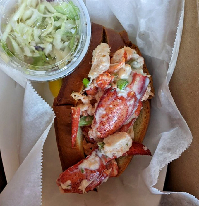 This isn't just a lobster roll&mdash;it's a masterclass in simplicity. Sweet chunks of Maine lobster nestled in a toasted bun with zero pretension.