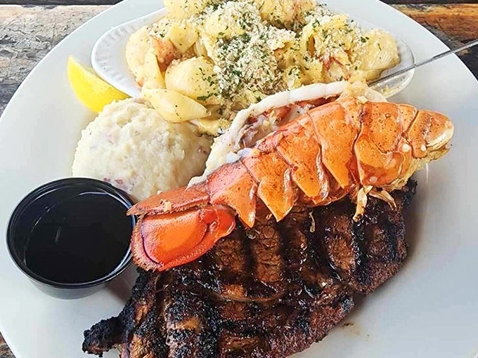 Surf meets turf in perfect harmony. That lobster tail isn't just dinner&mdash;it's the exclamation point on a plate of pure Florida joy.