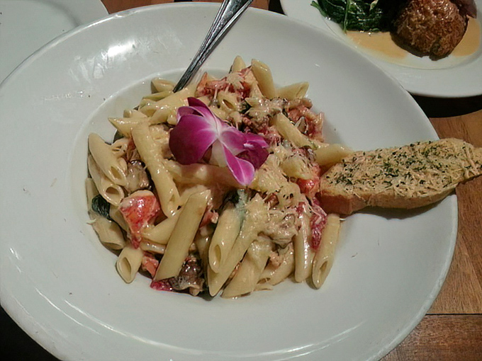 When pasta meets the ocean's bounty, magic happens – tender lobster and mushrooms in creamy perfection that'll haunt your dreams.