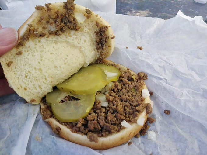 The legendary loose meat sandwich in all its humble glory&mdash;seasoned ground beef, pickles, and onions on a pillowy bun. Simplicity that defies imitation.