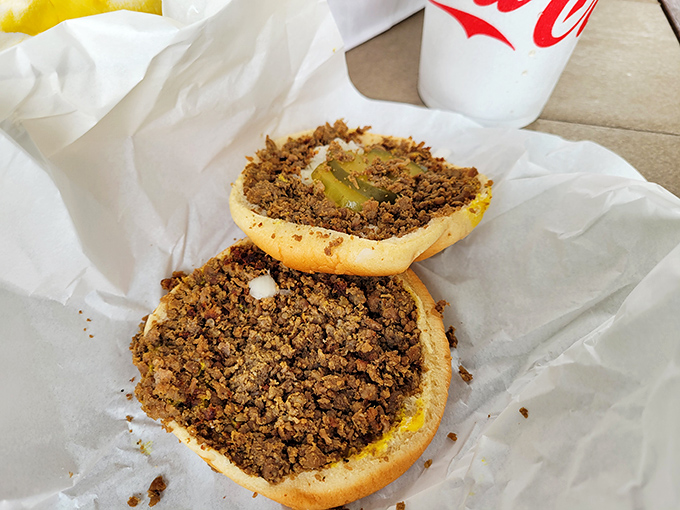 Behold the legendary loose meat sandwich, where seasoned ground beef meets bun in perfect harmony.