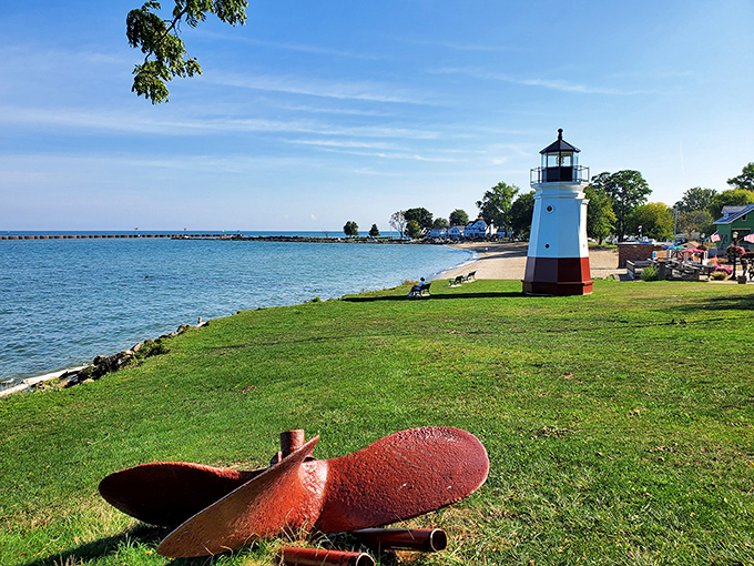 That miniature lighthouse isn't compensating for anything – it's a perfect beacon for this pocket-sized slice of Lake Erie paradise.