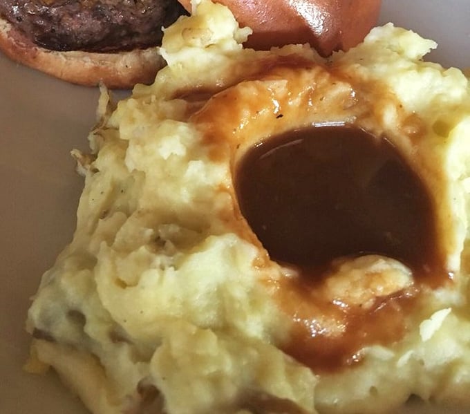 Behold the star of our show&mdash;garlic mashed potatoes with a gravy lake so perfect you'll want to dive in headfirst.