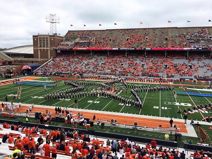 Game day at Memorial Stadium &ndash; where thousands of orange-clad fans and a marching band create the quintessential Midwestern college football experience.