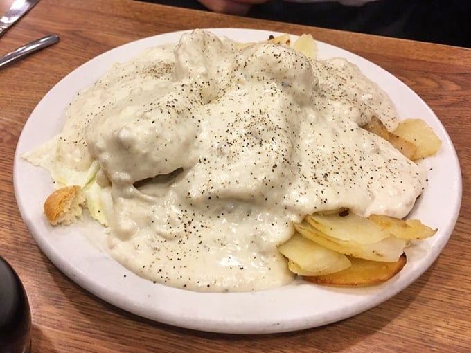 Behold the breakfast of champions! This plate doesn't just feed you&mdash;it hugs you from the inside out. The gravy-to-potato ratio is nothing short of mathematical perfection.