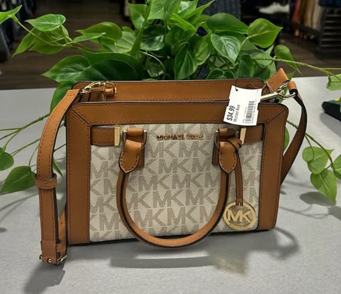 This Michael Kors satchel still sports its tags&mdash;fashion's equivalent of finding an unopened vintage bottle of wine.