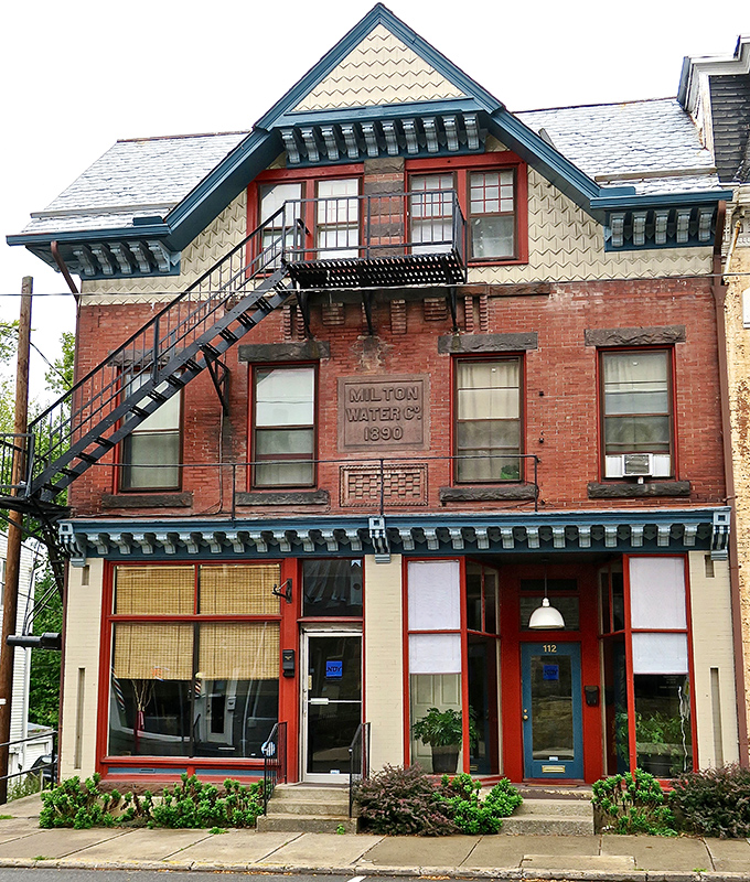 The Milton Water Co. building stands as a testament to when utility buildings were architectural showpieces, not concrete boxes with corporate logos.