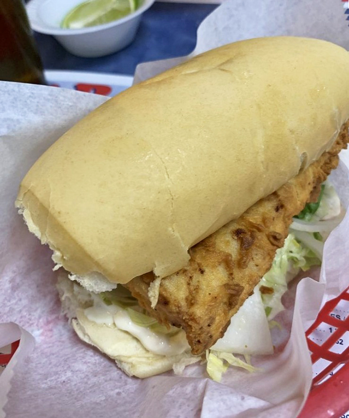 The legendary fish sandwich in all its glory. Golden-fried perfection nestled in pillowy bread &ndash; this is what seafood dreams are made of.