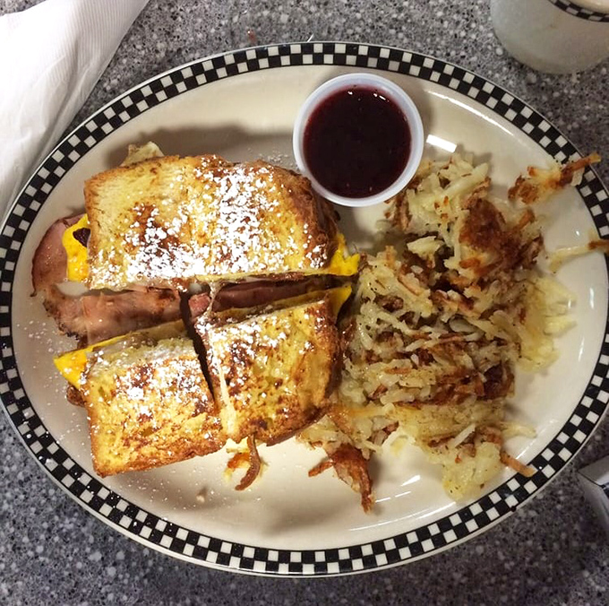 The Monte Cristo: where breakfast and lunch have a delicious identity crisis. That powdered sugar dusting isn't just garnish&mdash;it's essential magic.