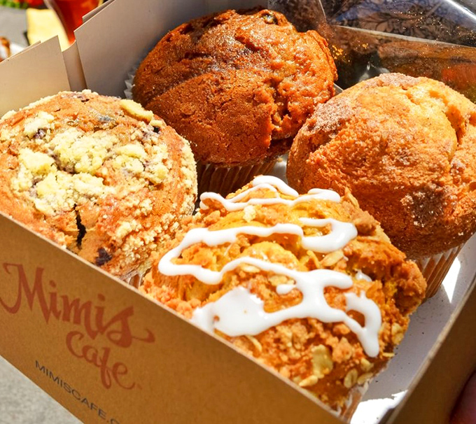 Muffin nirvana exists, and it comes in a cardboard box. These golden-crowned beauties aren't just baked goods—they're edible real estate in Flavor Country.