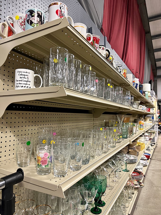 Glassware galore! From "Office" quote mugs to elegant stemware, this aisle proves one person's cabinet cleanout becomes another's dining room upgrade.