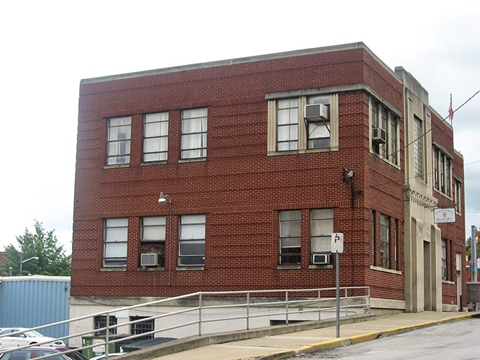 The sturdy municipal building stands as Brownsville's anchor, its no-nonsense brick façade reflecting the practical spirit of small-town governance.
