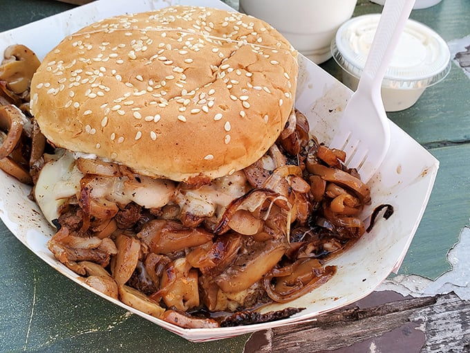 Mushroom Swiss nirvana on a sesame seed throne. When caramelized onions and melted cheese join forces, resistance becomes futile.