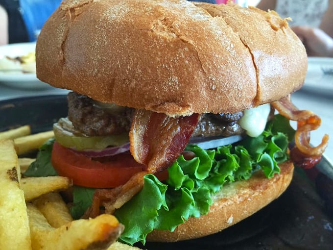 This isn't just a burger; it's edible architecture. Notice how that perfectly toasted bun contains the juicy masterpiece within &ndash; engineering you can eat!