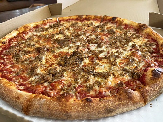 This sausage-topped NY-style pizza doesn't just talk the talk&mdash;it folds the fold, with a crust that somehow manages to be both substantial and ethereal.