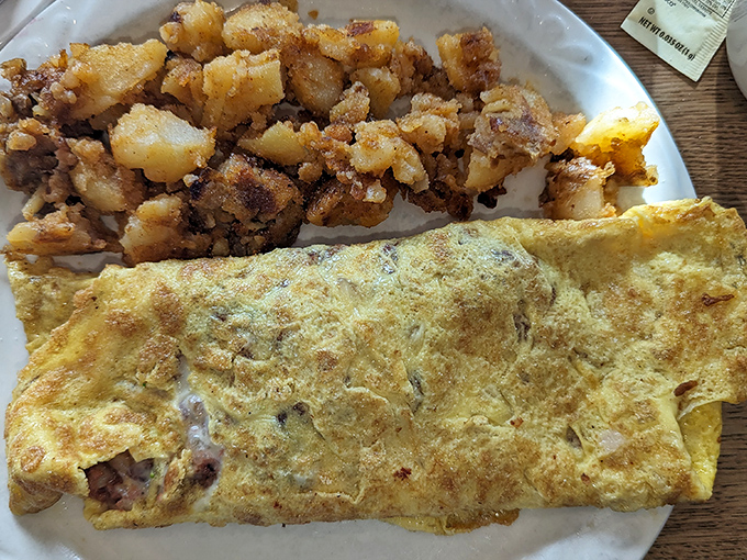 This Western omelet and home fries combo is the breakfast equivalent of a warm hug from your favorite aunt &ndash; familiar, comforting, and exactly what you needed.