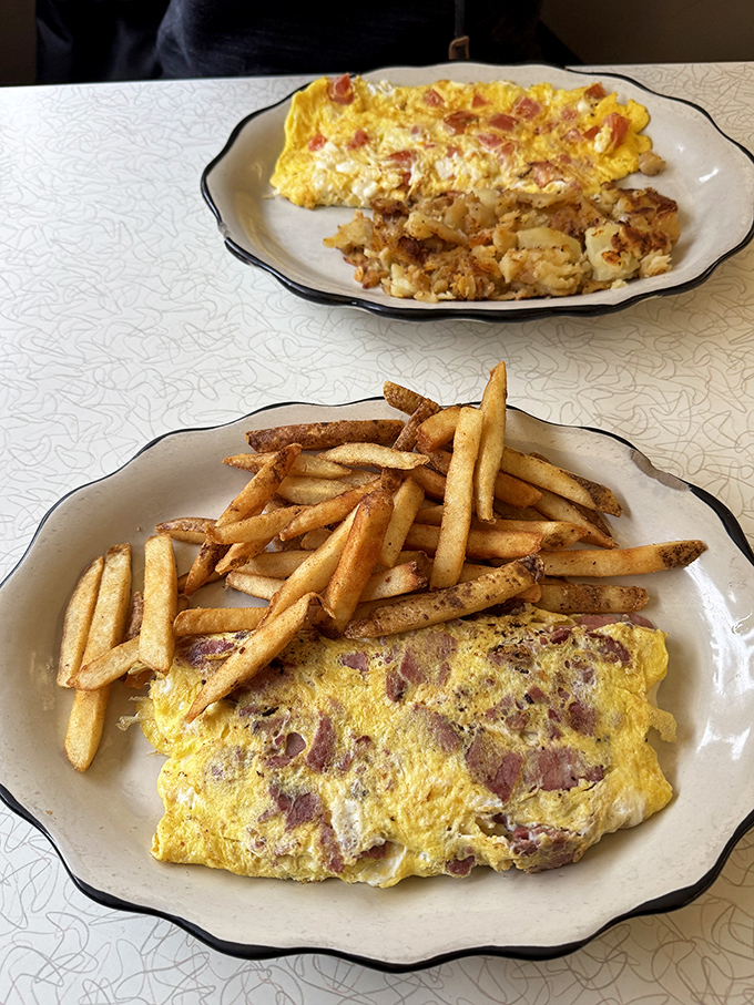 Golden perfection on a plate&mdash;this omelet doesn't need fancy culinary school techniques, just decades of diner know-how and generous fillings.