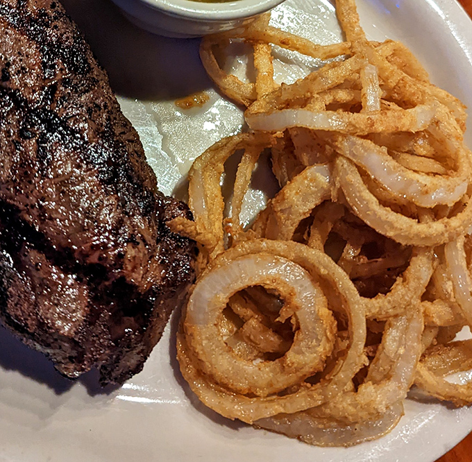 These aren't just onion rings; they're golden halos of perfection that might make you question every other onion ring you've ever eaten.