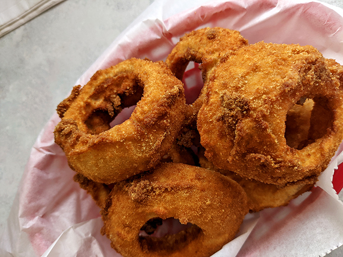 Golden halos of happiness that make you question why anyone would ever eat the frozen kind. These onion rings deserve their own Ohio historical marker. 