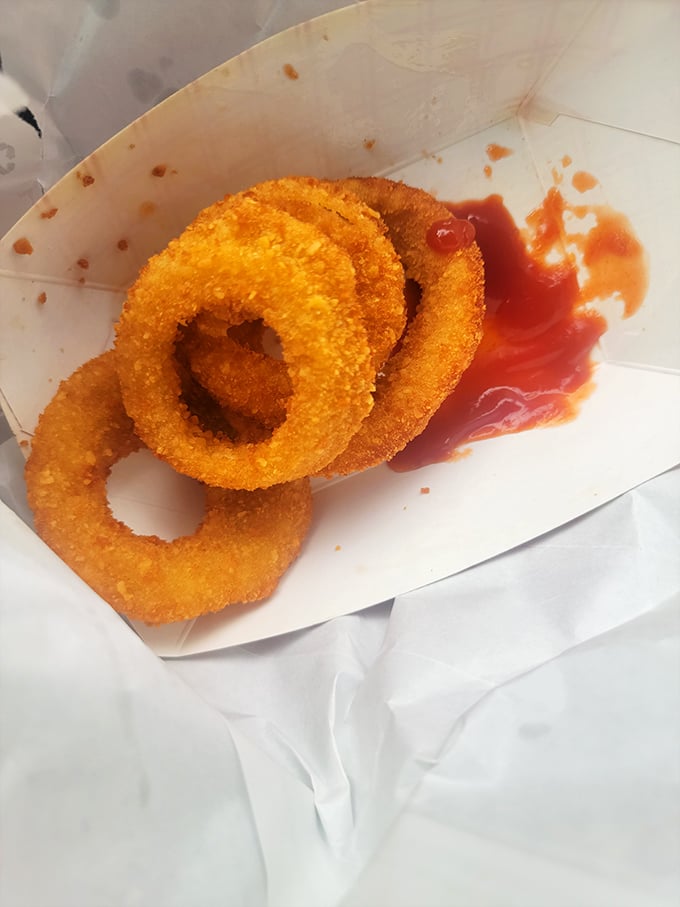 These onion rings aren't just side dishes&mdash;they're golden halos of happiness, crispy enough to make even the most dedicated chicken fan temporarily switch allegiances.