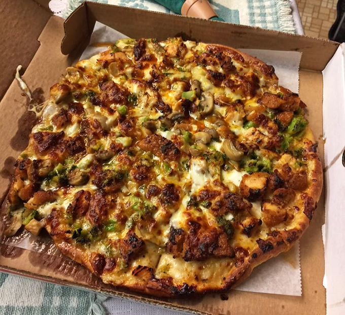 This isn't just pizza&mdash;it's edible real estate where every inch is prime property. Chicken, green peppers, and cheese living in delicious harmony.