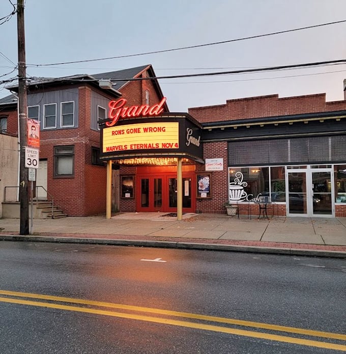 Dusk is when the Grand truly shines, its illuminated marquee beckoning moviegoers like a lighthouse for film lovers on Main Street.