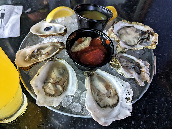Six perfect oysters arrive with all the fixings, proving great seafood travels well beyond coastlines.