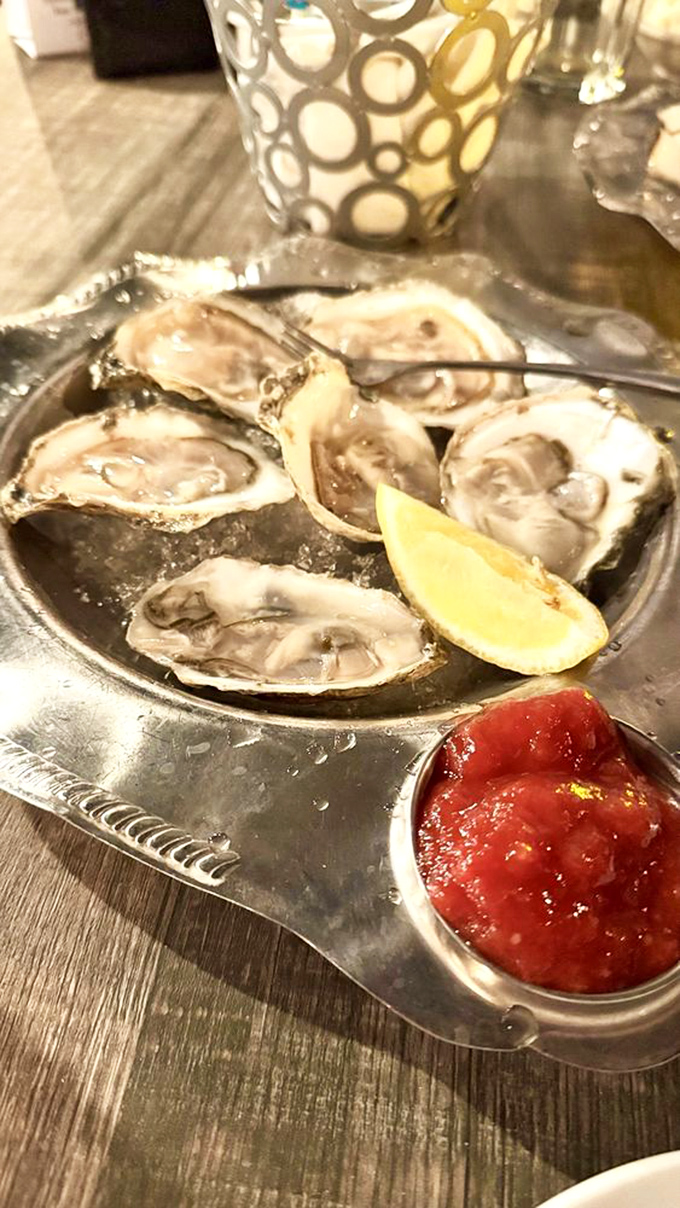 Fresh oysters on ice&mdash;nature's perfect appetizer. That tiny squeeze of lemon is all these briny treasures need before they slide down like silky ocean kisses.