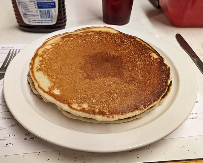 The pancake that launched a thousand road trips. Golden-brown perfection that makes you question every other pancake you've ever met.