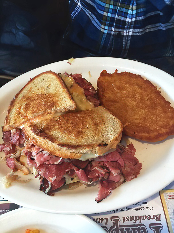 The star of the show&mdash;a perfectly executed sandwich with meat so tender it practically surrenders to your bite. That golden-brown rye bread deserves its own fan club.