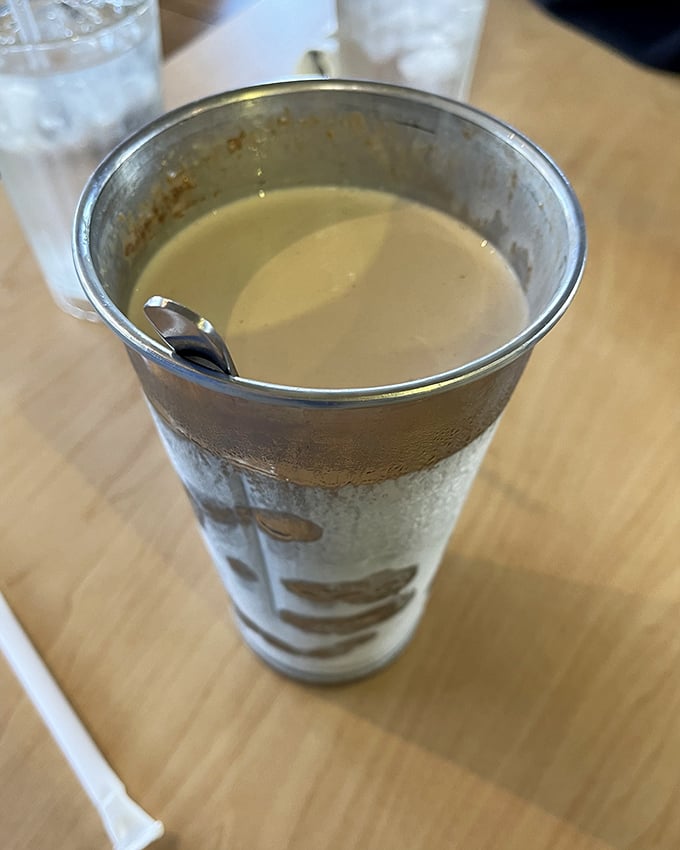 That's not just a milkshake, that's liquid nostalgia served in a tin cup. Young's Dairy ice cream transformed into sippable joy.