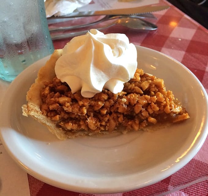 The legendary peanut pie in all its glory. That dollop of whipped cream isn't just garnish&mdash;it's the perfect dance partner.