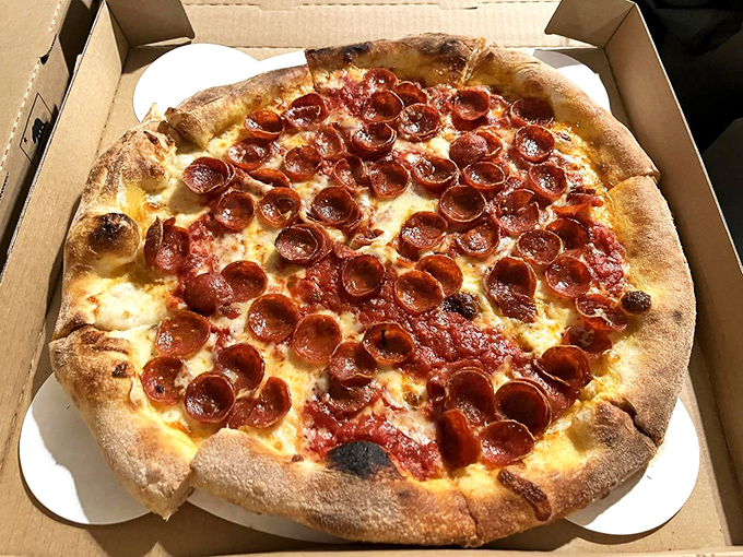 Pizza perfection exists, and here's the proof. Those cupped pepperoni edges cradle pools of savory goodness that will haunt your dreams.