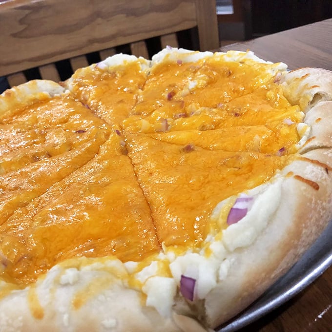 This cheese-laden pizza isn't just food&mdash;it's an edible hug with a golden crust and melty goodness that whispers, "Diet? What diet?"