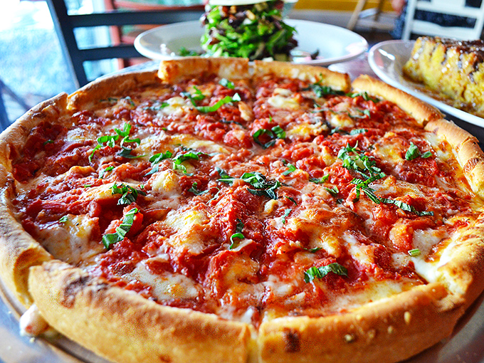 This isn't just pizza&mdash;it's architecture. A masterpiece of structural integrity with that golden crust holding a symphony of cheese and sauce.