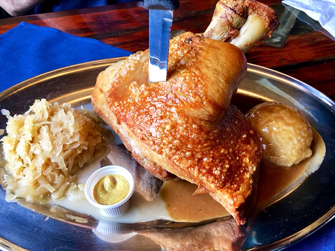 This crispy pork shank is what dreams are made of. Golden-brown crackling skin gives way to tender meat, with sauerkraut providing the perfect tangy counterpoint.