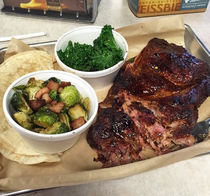 Behold the pork steak in all its glory&mdash;a glistening monument to smoke and patience. Those Brussels sprouts aren't just sidekicks.