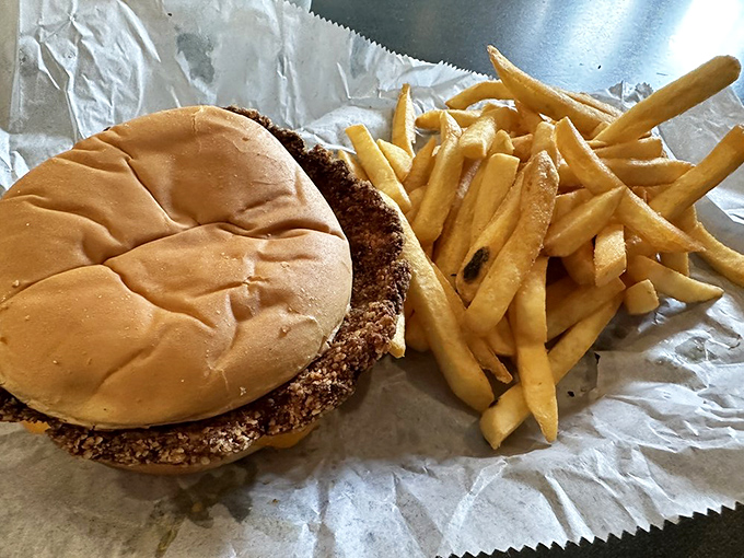 This isn't just a tenderloin sandwich&mdash;it's Indiana's edible handshake. Crispy, oversized, and demanding both hands and several napkins.