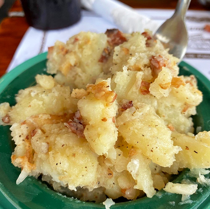 This isn't your aunt's mayo-drenched potato salad. Warm, vinegary, bacon-studded German-style spuds that might just ruin all other potato salads for you forever.
