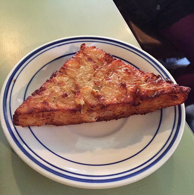 Golden-brown and crispy-edged, this potato latke isn't just breakfast&mdash;it's edible architecture with a side of cultural heritage.